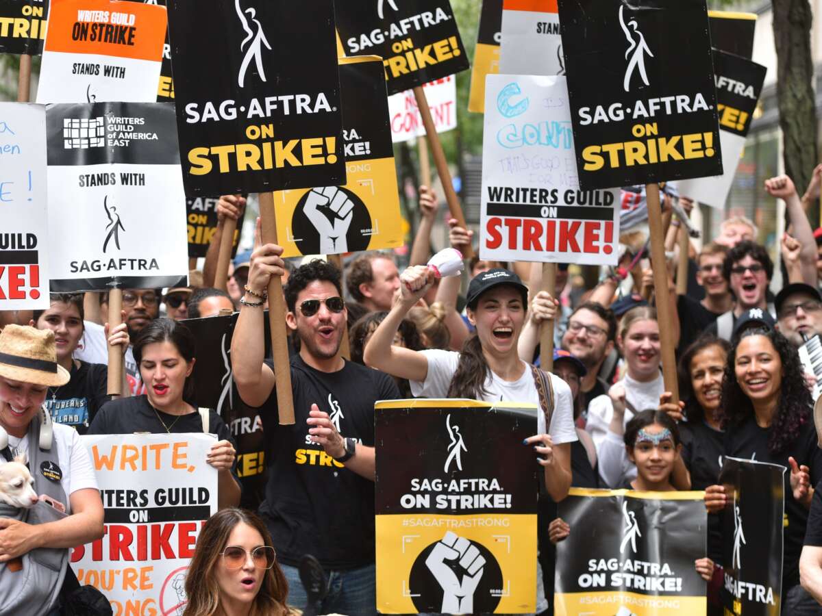 Amid Historic Strike, GM and Ford Announce Plans to Lay Off Workers ...